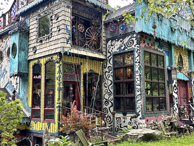 Guardian statues stand sentinel at the entrance, their expressions suggesting they've seen things that would make your suburban HOA faint.