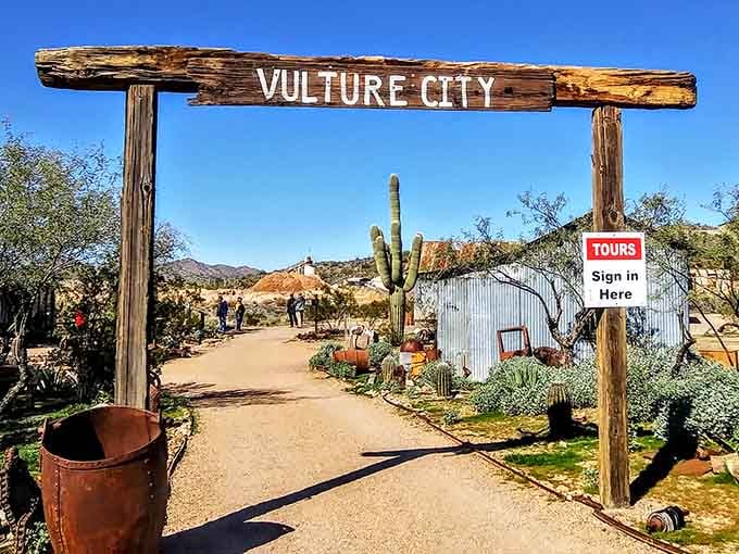 That weathered wooden sign welcomes you to a place where history isn't recreated, it's preserved.