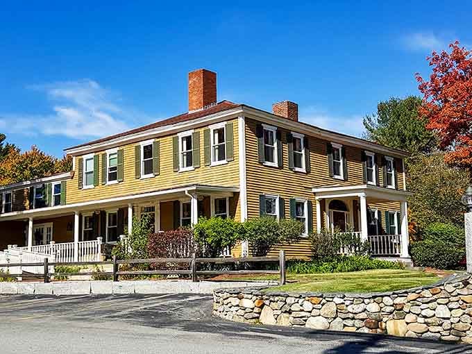 The iconic yellow exterior of Buckley's Great Steaks glows like a beacon of culinary promise, with its perfectly manicured topiary standing guard at the entrance.