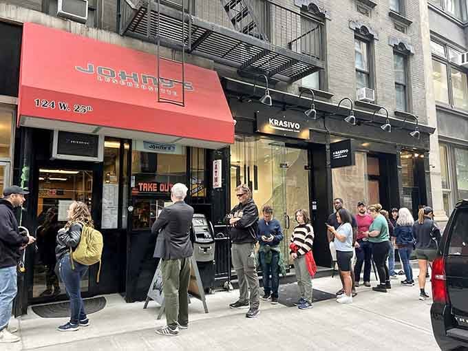 That red awning is your beacon to breakfast bliss in the heart of Greenwich Village.