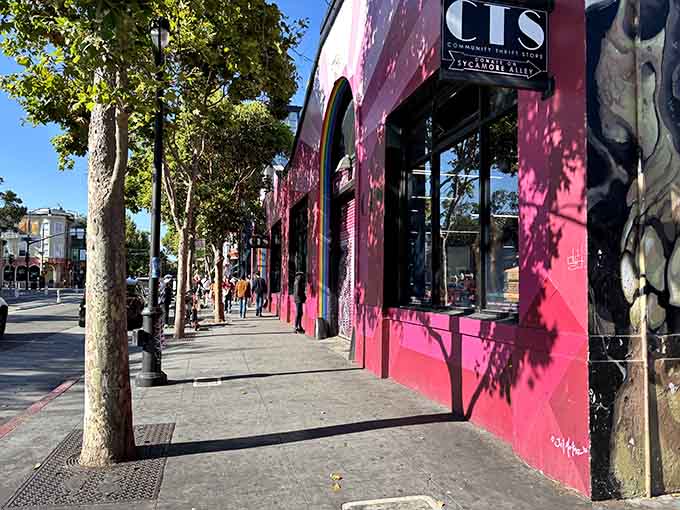 That hot pink exterior with rainbow murals isn't just eye-catching, it's practically demanding you come inside and explore.