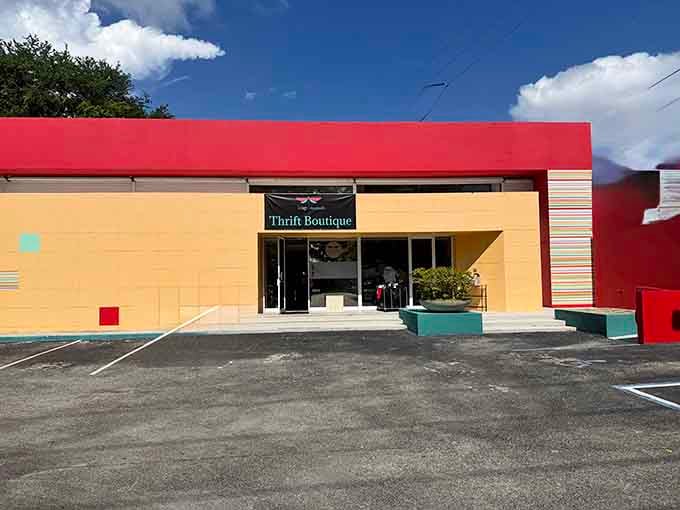 That bold coral and yellow exterior isn't shy about announcing treasure awaits inside this South Miami gem.