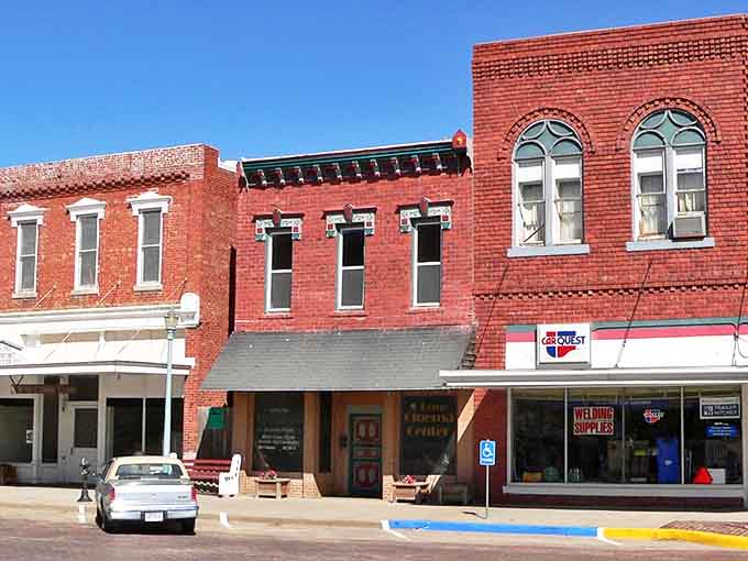 Historic brick buildings line Webster Street, their weathered facades telling stories of prairie pioneers and small-town dreams that Willa Cather immortalized in her novels.