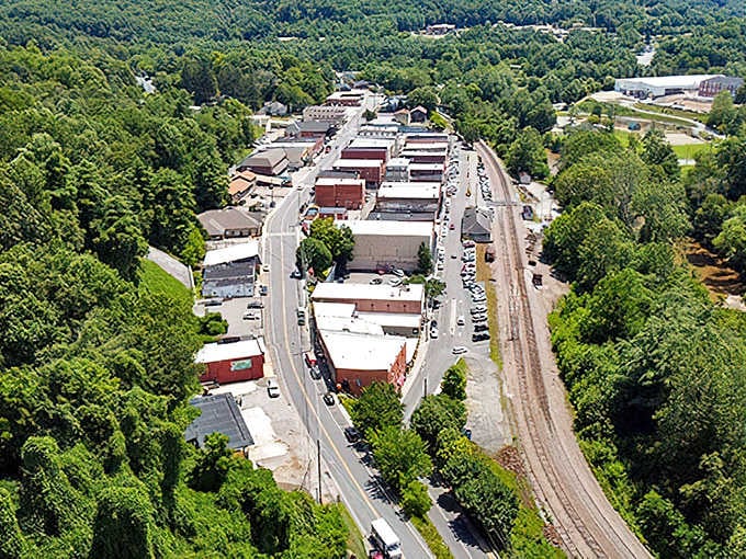 A bird's-eye view reveals Spruce Pine's perfect nestling among the Blue Ridge Mountains, with nature embracing civilization in a gentle hug.