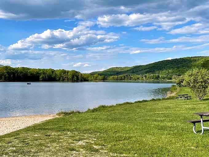 Lake Habeeb's mirror-like surface reflects the mountains so perfectly, you'll wonder if Mother Nature moonlights as a professional photographer.
