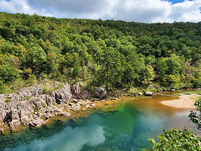 The emerald waters of the Black River wind through ancient volcanic rock, creating a postcard-worthy scene at Johnson's Shut-Ins.