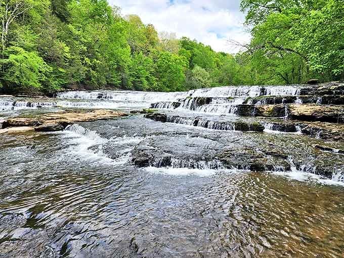 The cascading steps of Burgess Falls create a natural staircase effect, where the Falling Water River dances across limestone ledges.