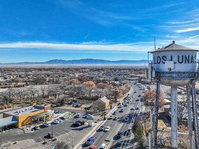 The iconic Los Lunas water tower stands sentinel over this charming village, where the Manzano Mountains create a backdrop worthy of a movie set.