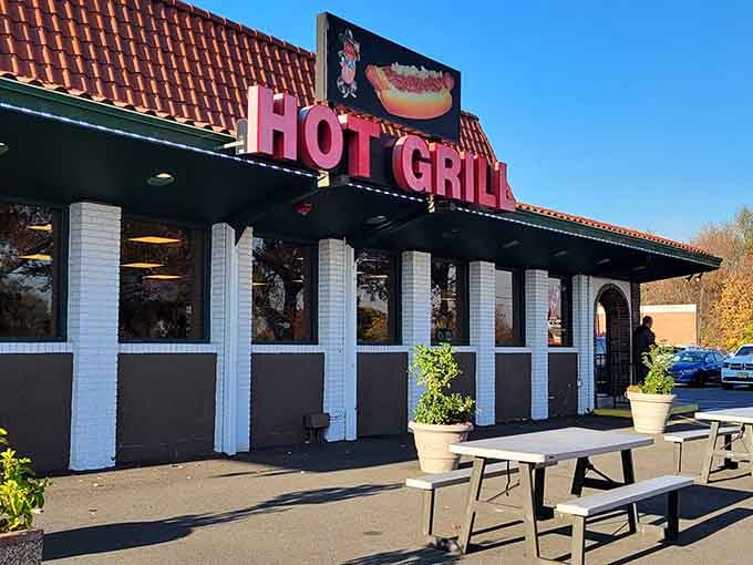 Hot Grill's exterior White pillars frame the entrance like columns at a temple, except this one worships at the altar of frankfurters.