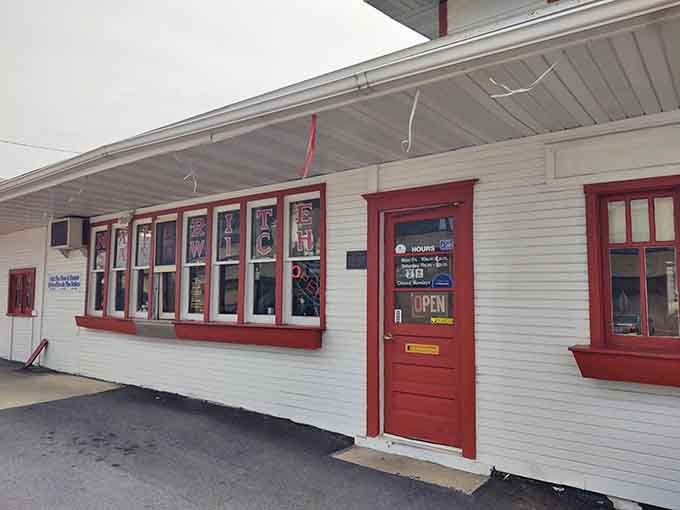 That cheerful red door has been welcoming hungry souls since the Roaring Twenties, and it still works like magic.