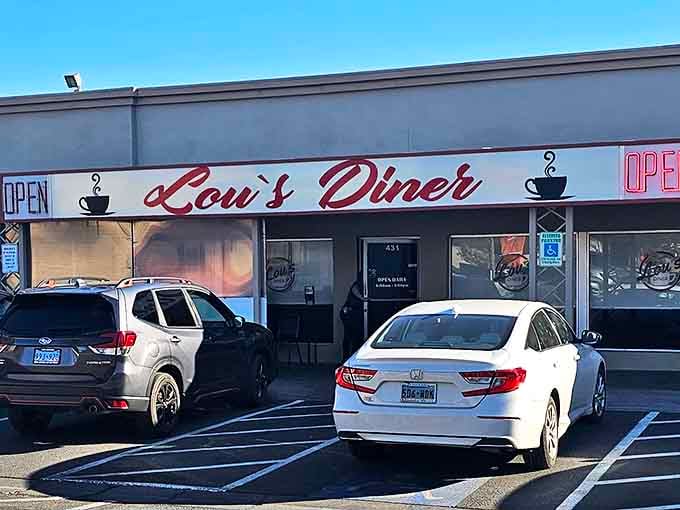 The classic red script of Lou's Diner beckons like an old friend against the bright Nevada sky, promising comfort food treasures that Vegas high-rollers wish they knew about.