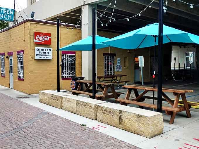 Outdoor seating adds a modern touch to this timeless institution, where wooden picnic tables invite you to savor your loose meat sandwich al fresco.