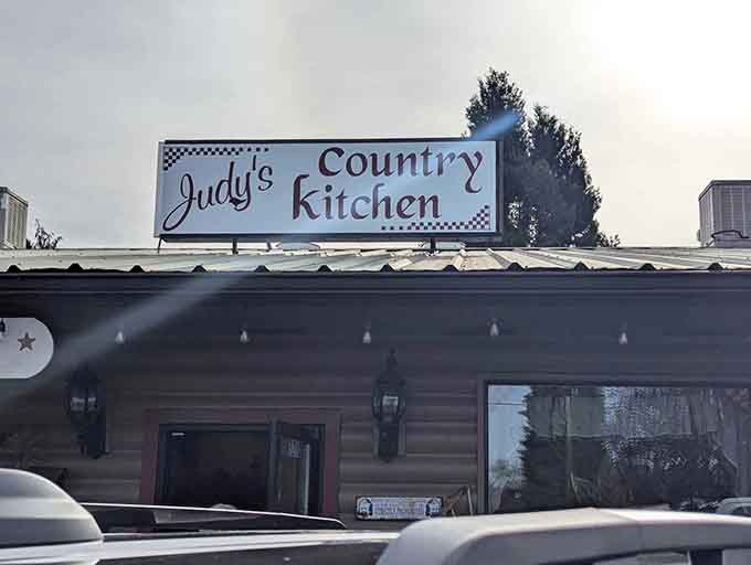 That log cabin exterior with stone accents isn't just for show, it's a promise of the comfort waiting inside.