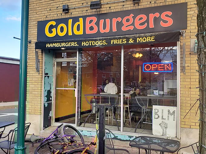 The golden letters against brick say it all: unpretentious, straightforward, and promising burger bliss that keeps locals coming back.