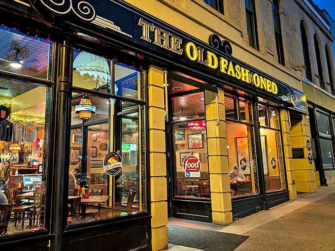 As dusk falls, The Old Fashioned glows like a beacon of culinary hope, with the majestic Capitol dome reflected in its windows &ndash; a postcard-perfect Wisconsin evening.