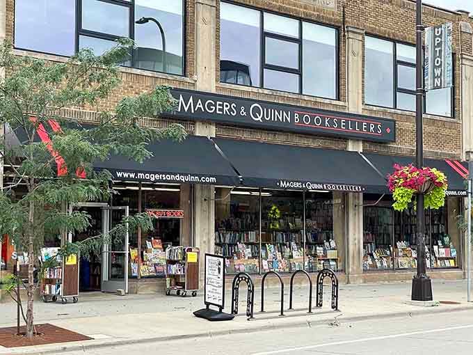 That distinctive blue awning beckons book lovers like a lighthouse guides ships through stormy Minnesota nights.