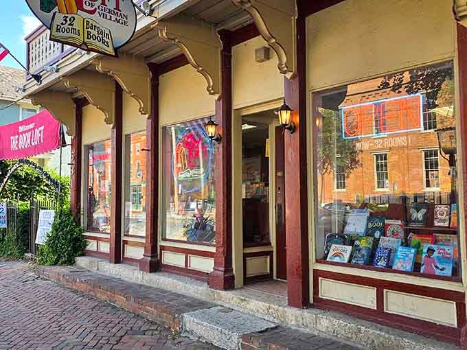 That charming storefront practically whispers "come get lost in here for three hours" through its historic windows.
