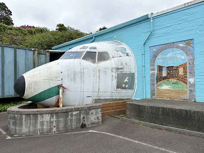 There's even a vintage airplane fuselage outside, because why shouldn't a bookstore have aviation history?