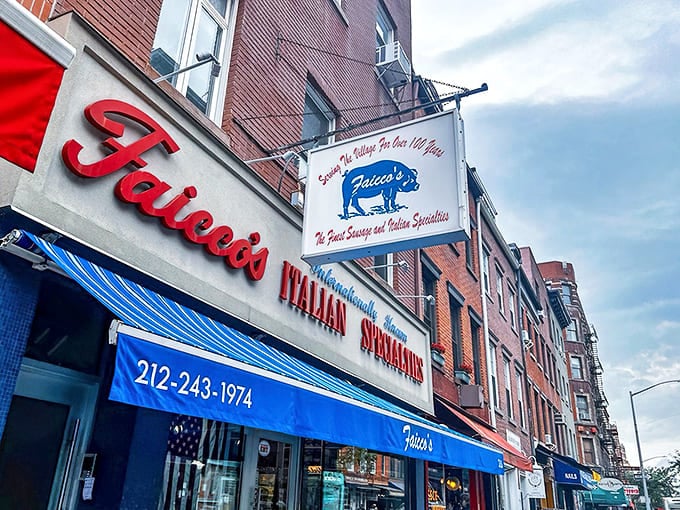 The iconic red lettering of Faicco's against the brick facade isn't just a sign&mdash;it's a beacon for sandwich pilgrims seeking Italian-American nirvana on Bleecker Street.