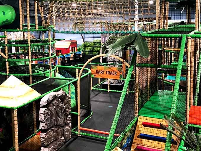 Obstacle courses challenge coordination while parents watch and remember when they could do backflips without consequences.