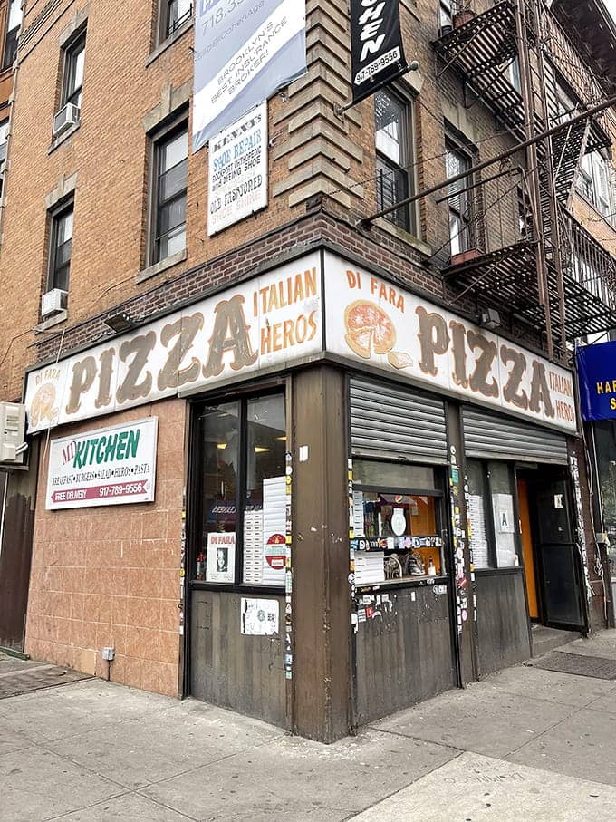 That weathered sign isn't a design choice, it's a badge of honor earned through decades of pizza perfection.