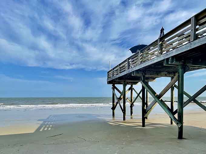 That weathered pier isn't just photogenic, it's your front-row seat to dolphin shows and spectacular sunsets.