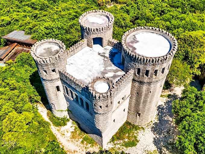 Medieval majesty meets Florida sunshine as Castle Otttis's imposing towers rise above the coastal greenery, looking like it was airlifted straight from the Irish countryside.