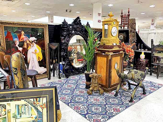 Time stands still in this opulent vignette. A golden clock commands center stage among carved mirrors and dramatic artwork, like a movie set for "Antiques Roadshow: The Blockbuster."