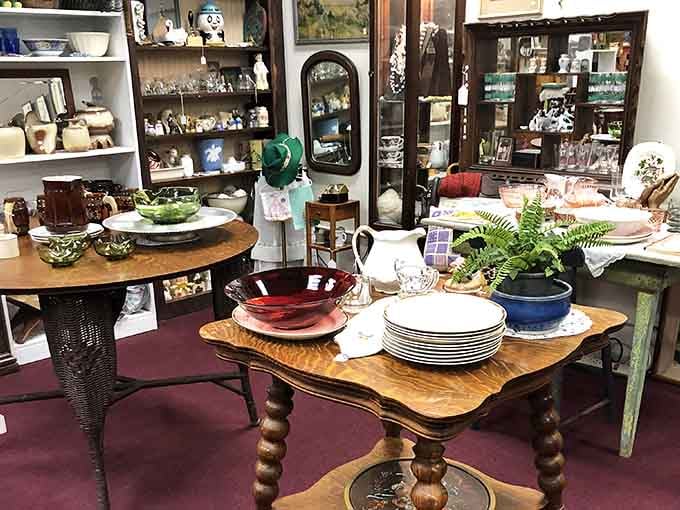 Vintage glassware and collectibles arranged like a museum exhibit, except here you can actually take the artifacts home with you.