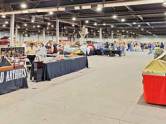 The vast exhibition hall transforms into a shopper's paradise where antiques and collectibles wait to find their perfect new homes.
