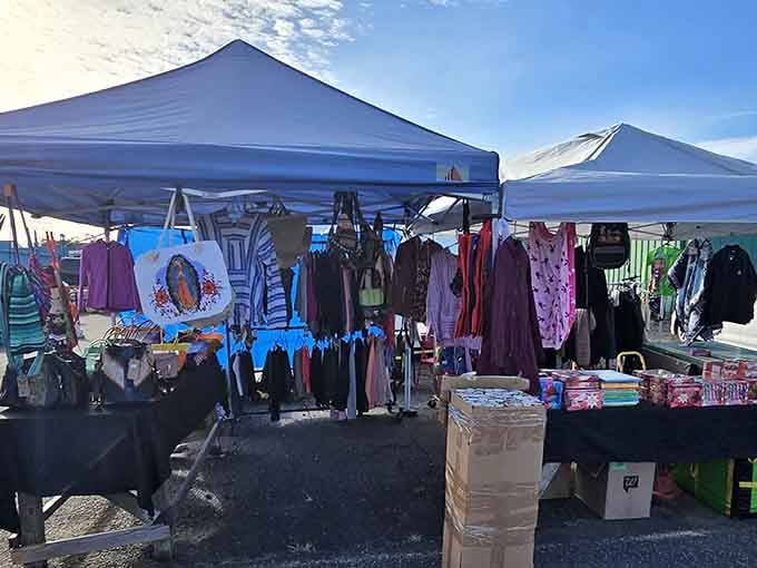 Clothing racks under open sky prove that the best dressing rooms come with fresh air and unlimited browsing time.