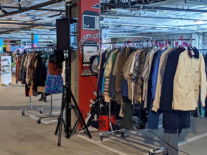 The indoor section transforms ordinary parking structures into galleries of vintage clothing, where yesterday's styles become tomorrow's statement pieces.