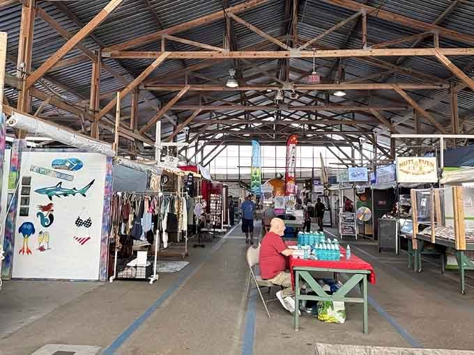 The exposed beam ceiling and endless aisles create a treasure hunter's cathedral where bargains are the religion practiced daily.