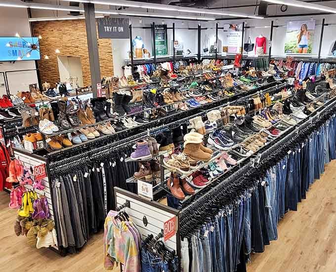 Rows of shoes stretch like a footwear buffet where every pair whispers "take me home" to your wallet.