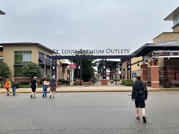 The grand entrance beckons like a portal to retail paradise, where your wallet trembles with anticipation.