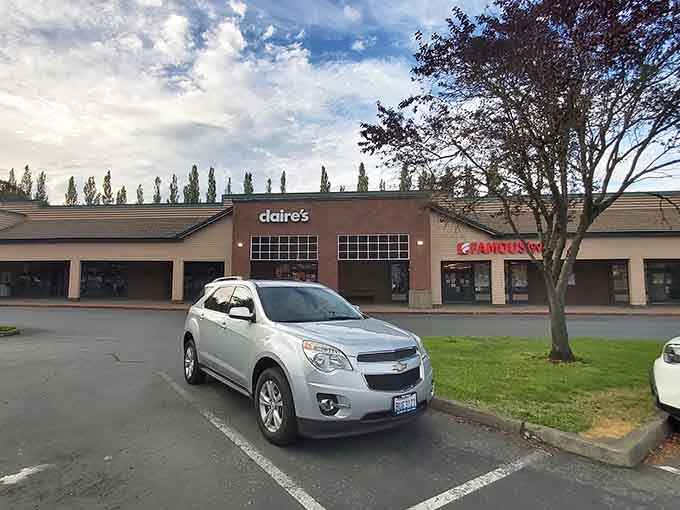 Those misty clouds create the kind of moody backdrop that makes parking lot photography actually worth your time.