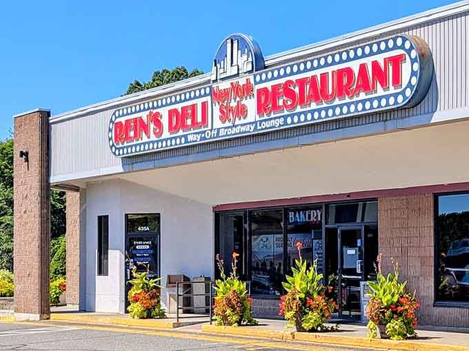 That retro sign gleaming in the sunshine is basically a bat signal for sandwich lovers everywhere.