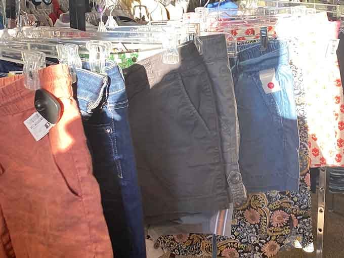 Denim democracy in action! These colorful pants hanging neatly in a row prove that style comes in all colors and sizes—just like the shoppers who love them.
