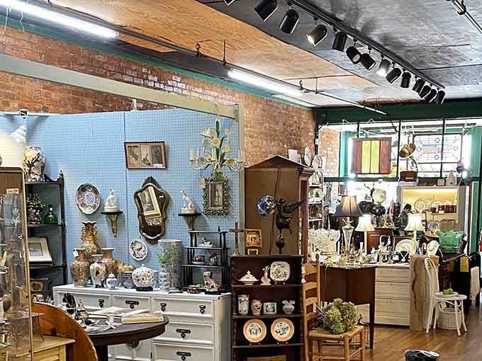 Exposed brick meets vintage treasures in a space where your grandmother's taste and your Pinterest board finally agree on something beautiful.