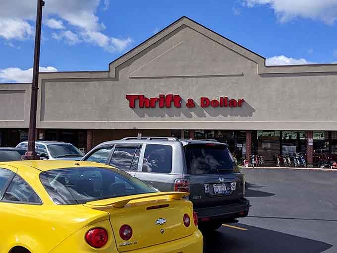 Thrift & Dollar's bright red sign beckons from the strip mall like a lighthouse for the budget-conscious explorer. Adventure awaits in this suburban treasure chest.