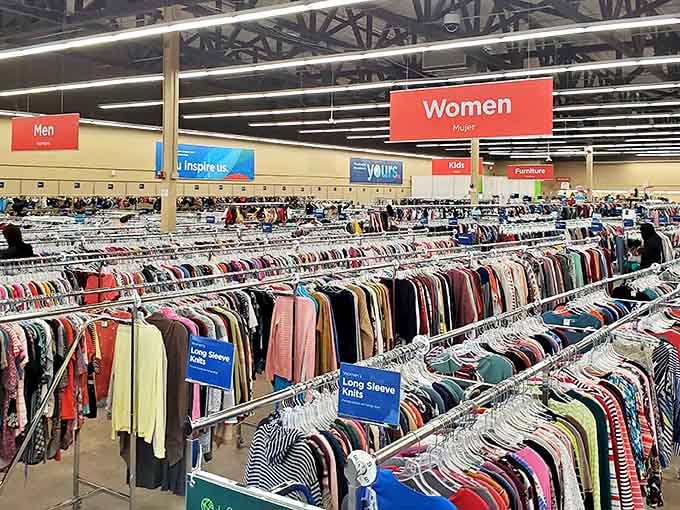 A rainbow of possibilities stretches to the horizon. At Savers, clothing racks are organized with the precision of someone who alphabetizes their spice rack.