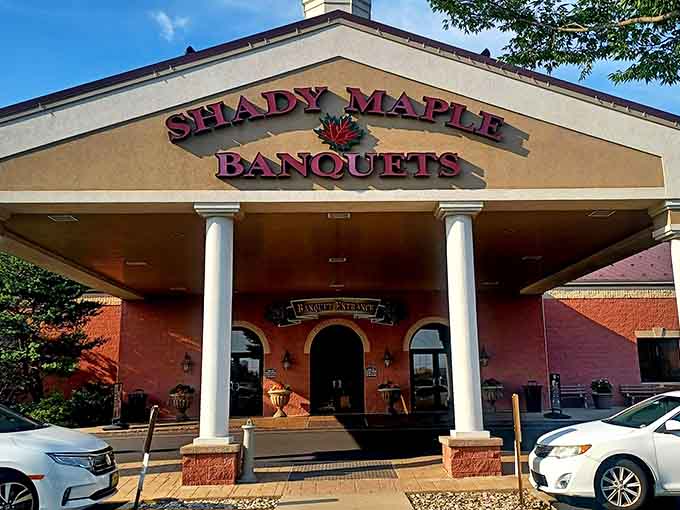 That grand entrance with the white columns isn't just welcoming you, it's practically begging you to come inside and eat.