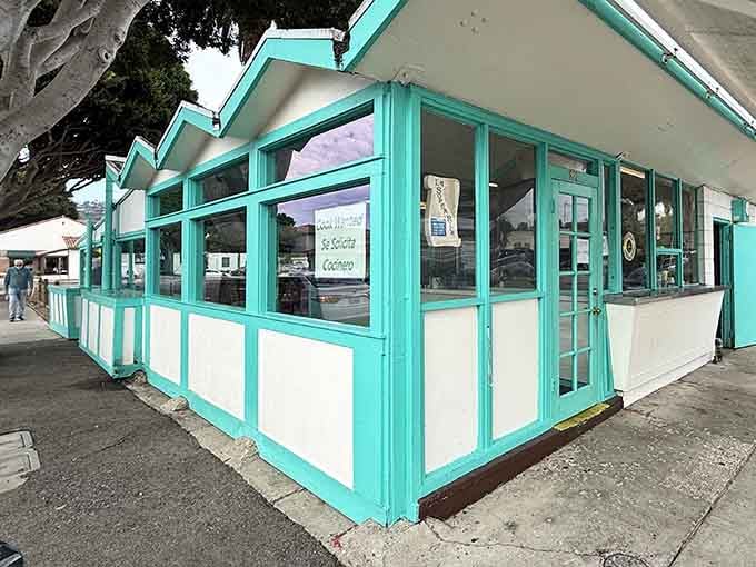 That distinctive turquoise building practically glows in the Santa Barbara sun, impossible to miss or forget.