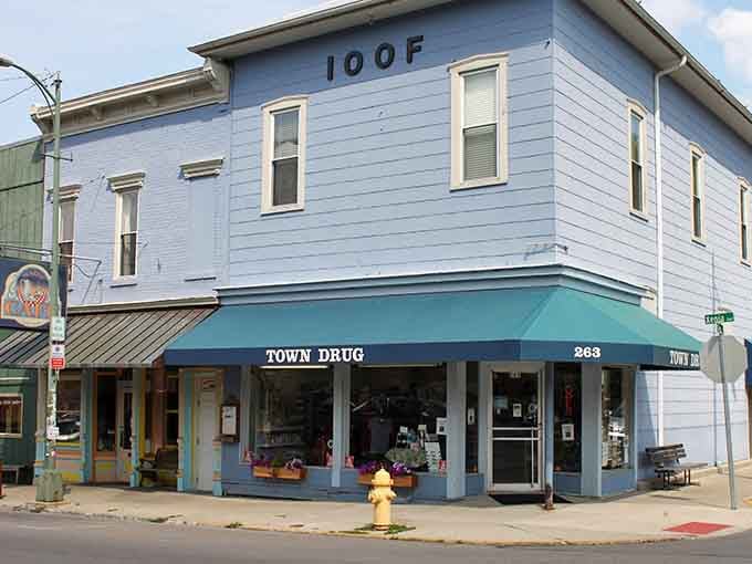 That charming blue storefront isn't just any drugstore, it's a slice of small-town Americana that still exists.