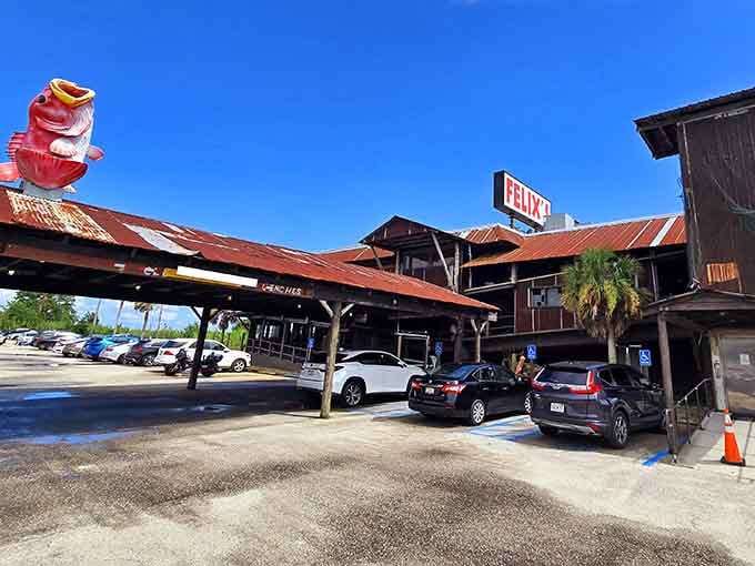 The unmistakable red fish on the roof announces your arrival at seafood paradise, where rustic charm meets Gulf Coast flavor.