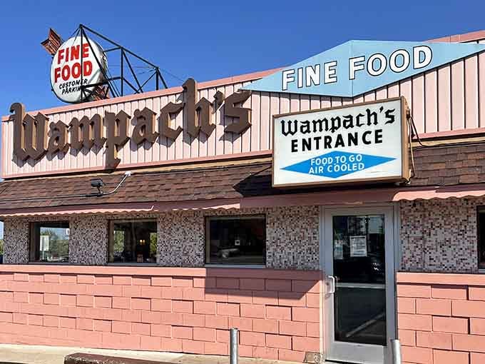 That iconic pink building stands proud on the roadside, a beacon calling breakfast lovers from miles around daily.