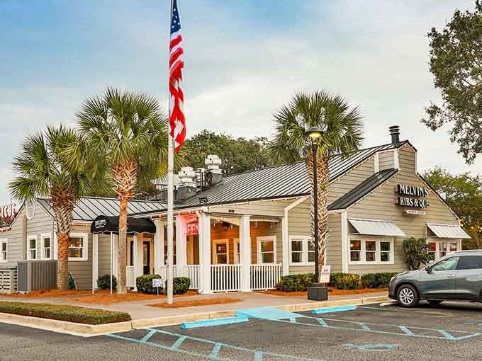 That cheerful exterior with the palm tree says "Southern hospitality" louder than a church bell on Sunday morning.