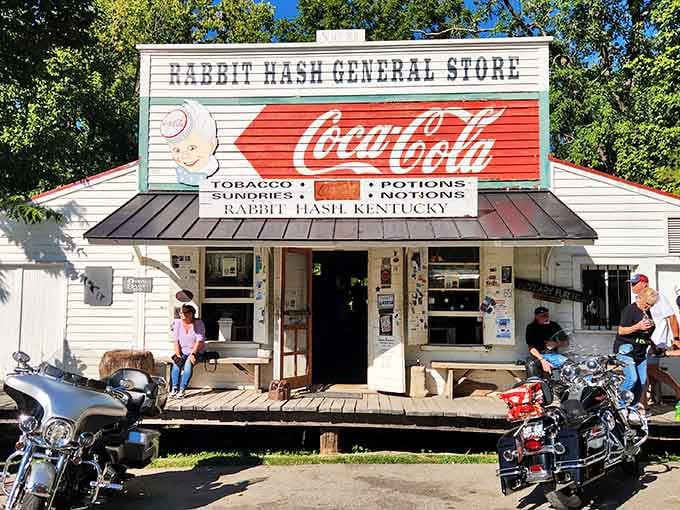 That Coca-Cola sign has witnessed nearly two centuries of American history, and it's still selling the dream beautifully.