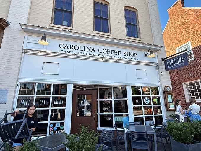 That classic white facade has welcomed hungry souls through its doors for over a century of breakfast dreams.