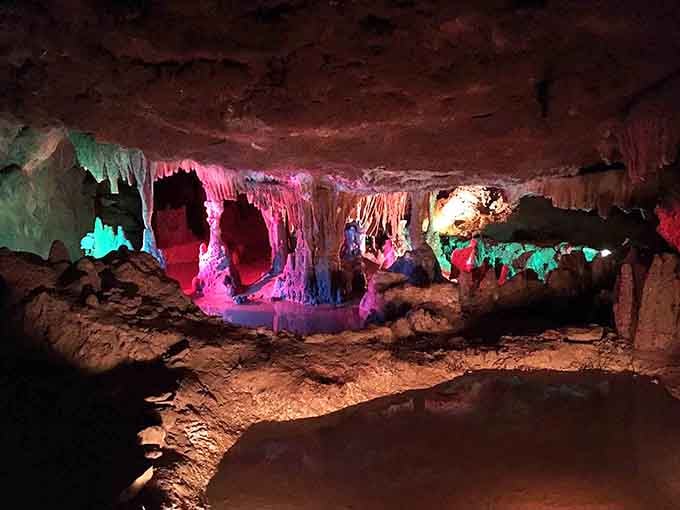 Those colored lights transform ancient limestone into something that looks like a disco designed by Mother Nature herself.